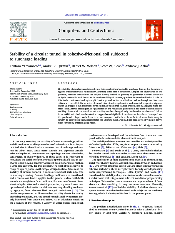 Stability of a circular tunnel in cohesive-frictional soil subjected to surcharge loading