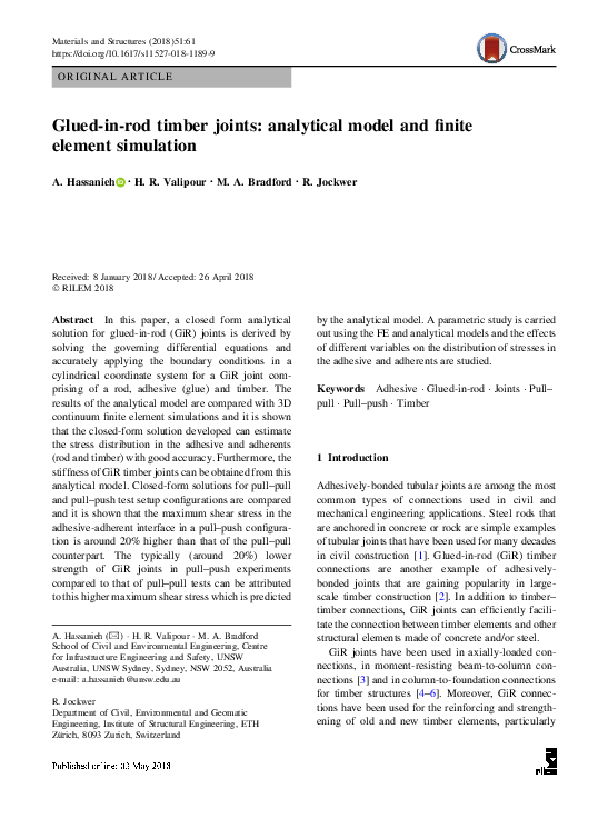 Glued-in-rod timber joints: analytical model and finite element simulation